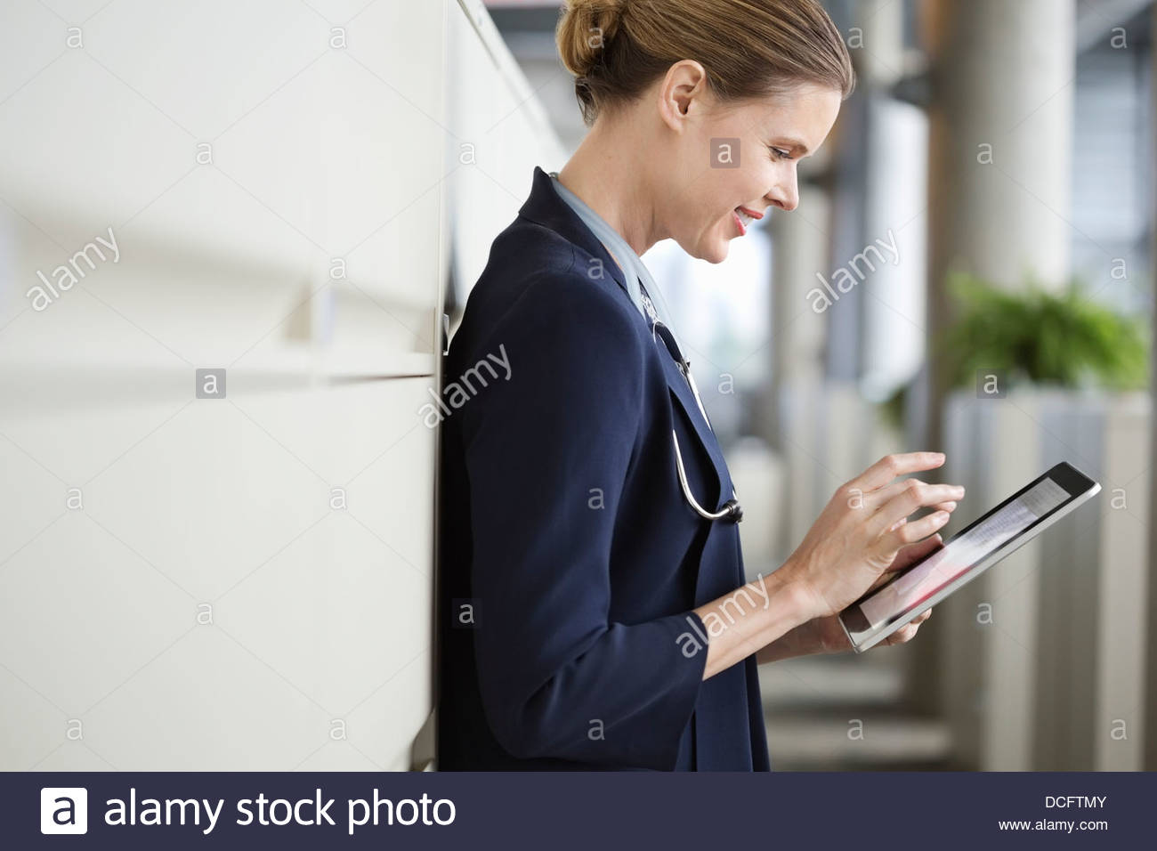 Doctor back using stethoscope hi-res stock photography and images - Alamy