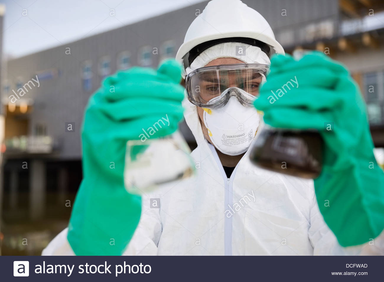 Technician comparing water samples Stock Photo - Alamy