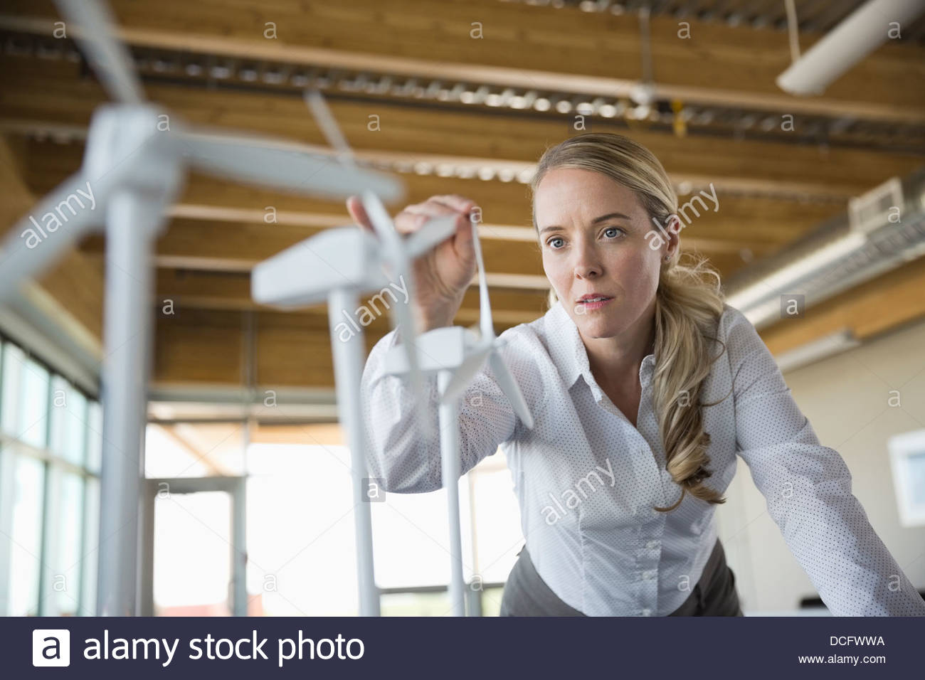 Sustainable energy engineer working with prototypes Stock Photo - Alamy