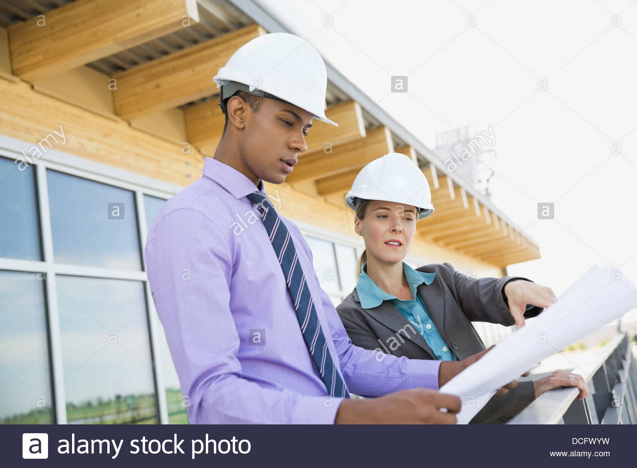 Two engineers blueprint hi-res stock photography and images - Alamy