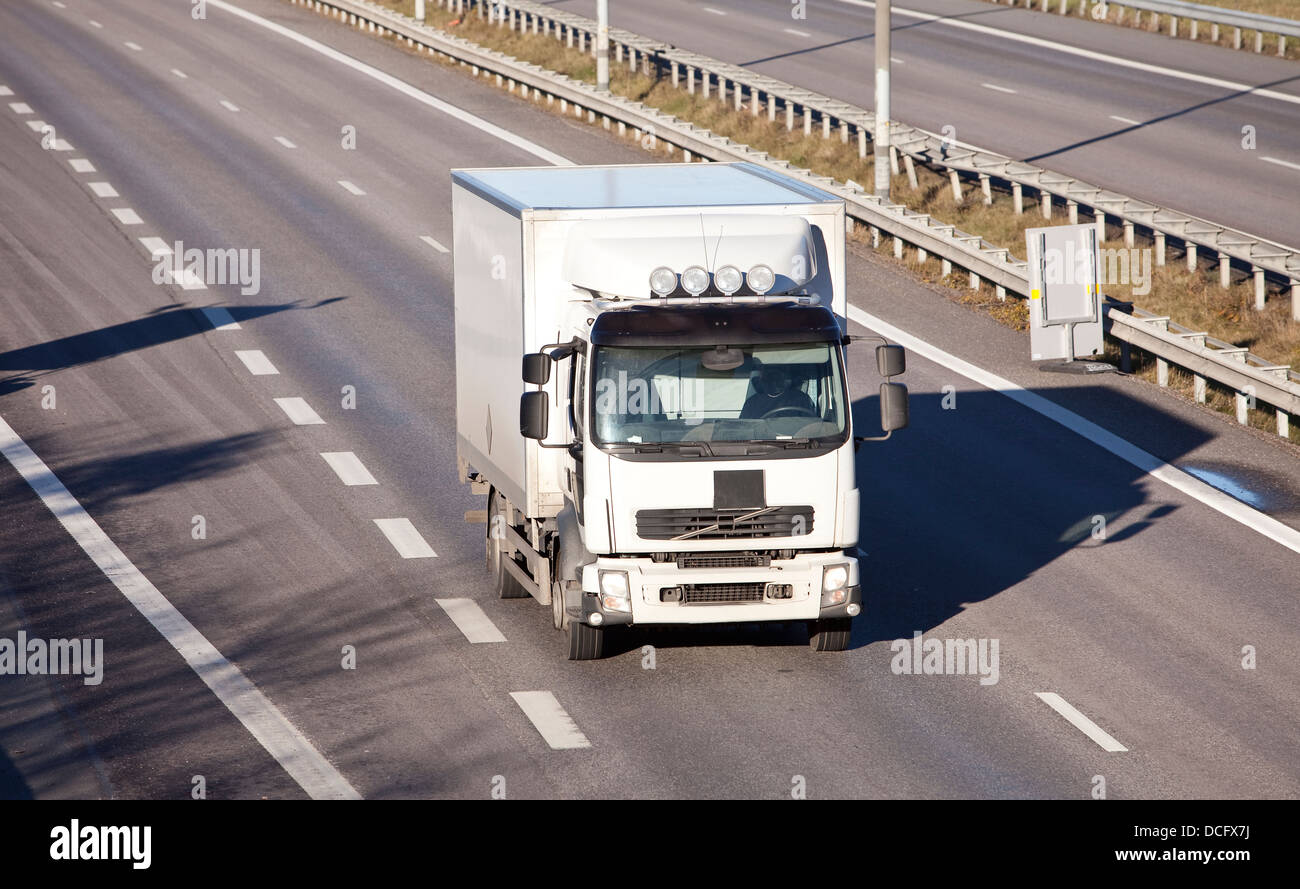 Truck on Highway Stock Photo - Alamy