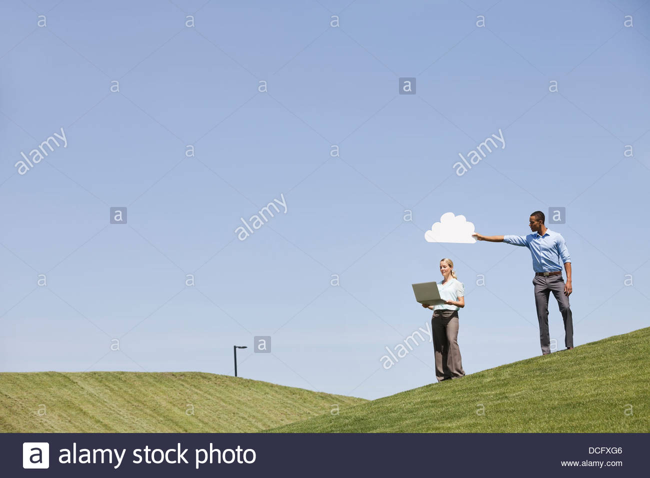 Helping out colleague hi-res stock photography and images - Alamy
