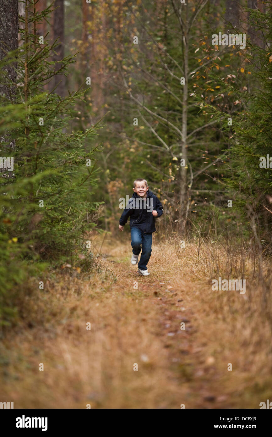 Little Boy Running Stock Photo - Alamy