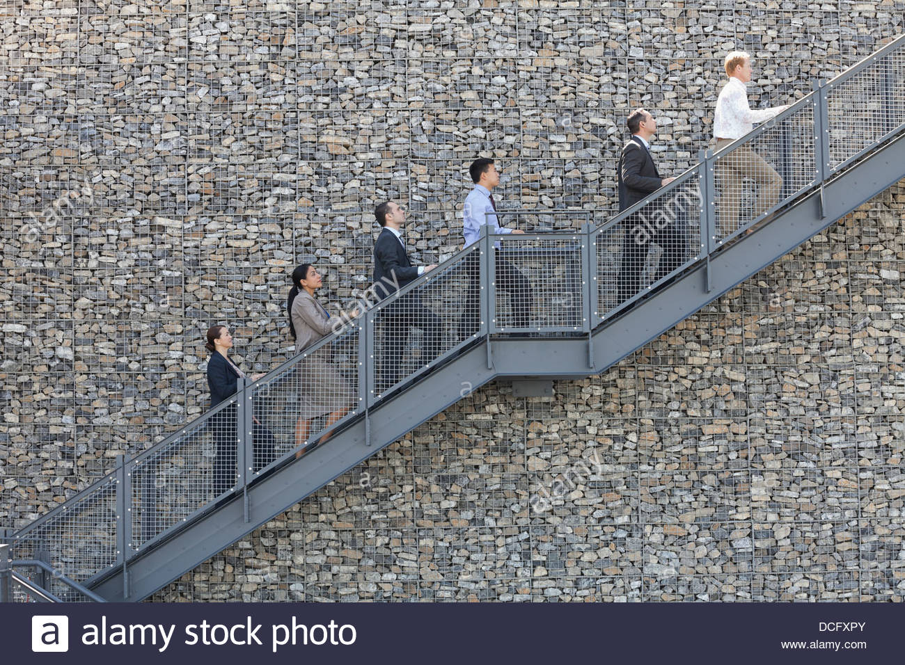 Line people row climbing moving stairs hi-res stock photography and ...