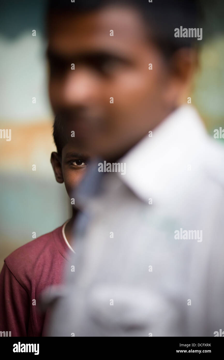 The boy in the crowd looking directly into the camera Stock Photo - Alamy