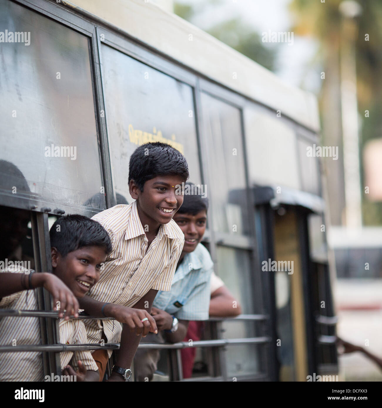 Indian school children look out of the windows of the bus Stock Photo ...