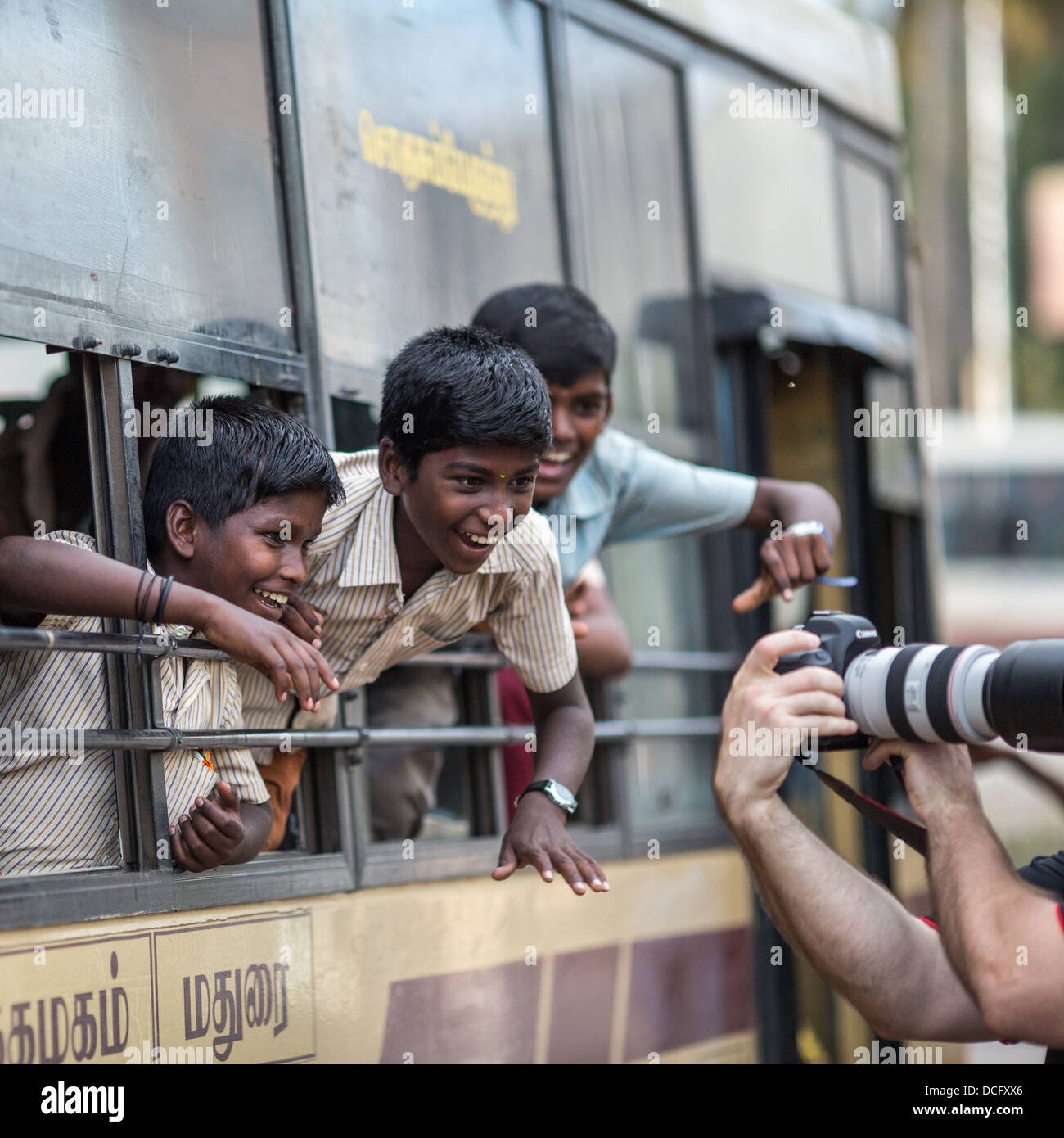 Indian school children look out of the windows of the bus Stock Photo ...