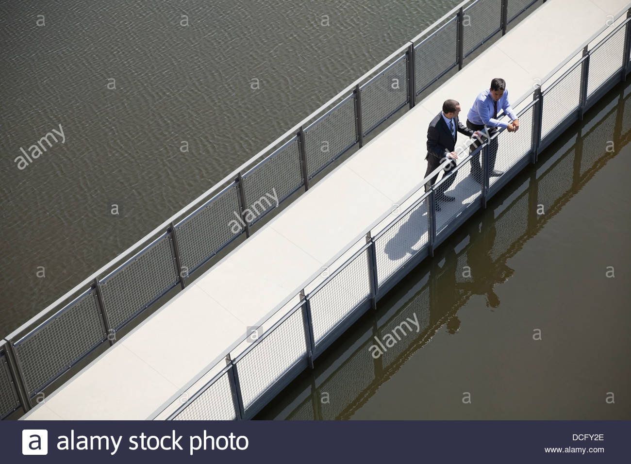 Leaning on bridge railing hi-res stock photography and images - Alamy