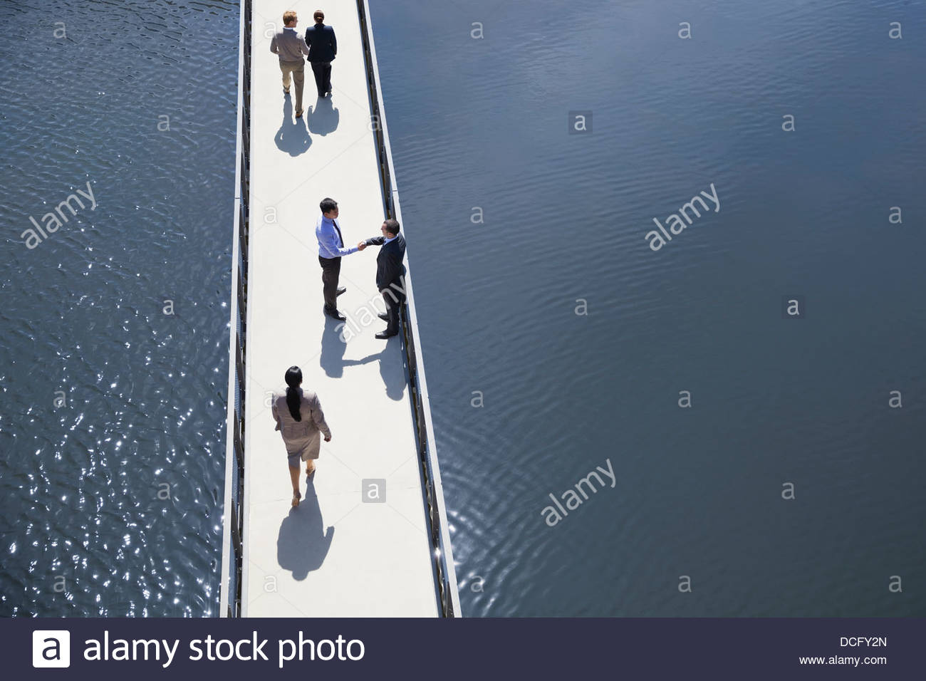 Women shaking hands outdoors hi-res stock photography and images - Alamy
