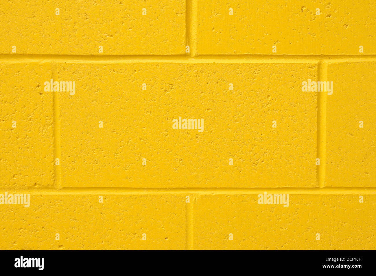 Yellow brick wall background Stock Photo - Alamy