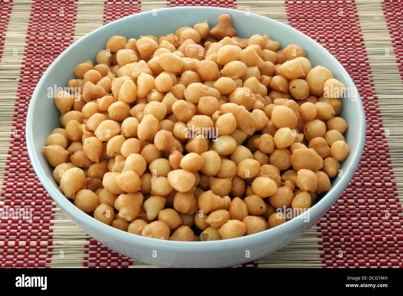 fried batter pearls in a blue bowl Stock Photo - Alamy