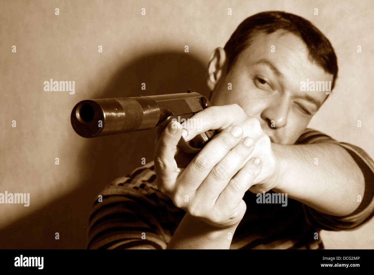 man with a pistol Stock Photo - Alamy