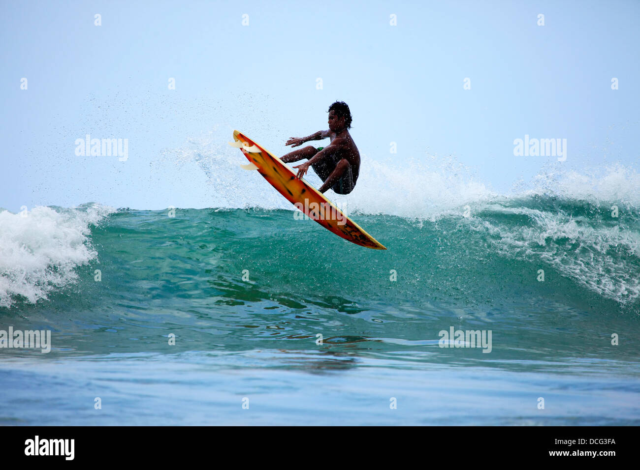 Surfer in ocean Stock Photo - Alamy