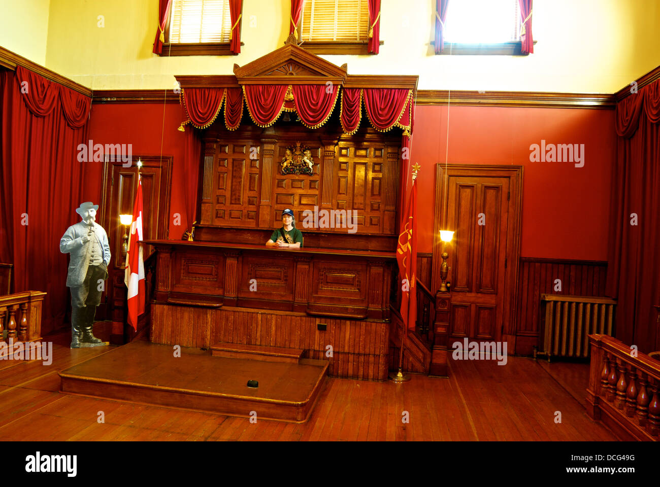 Female tourist sitting judge bench former assizes courtroom heritage ...