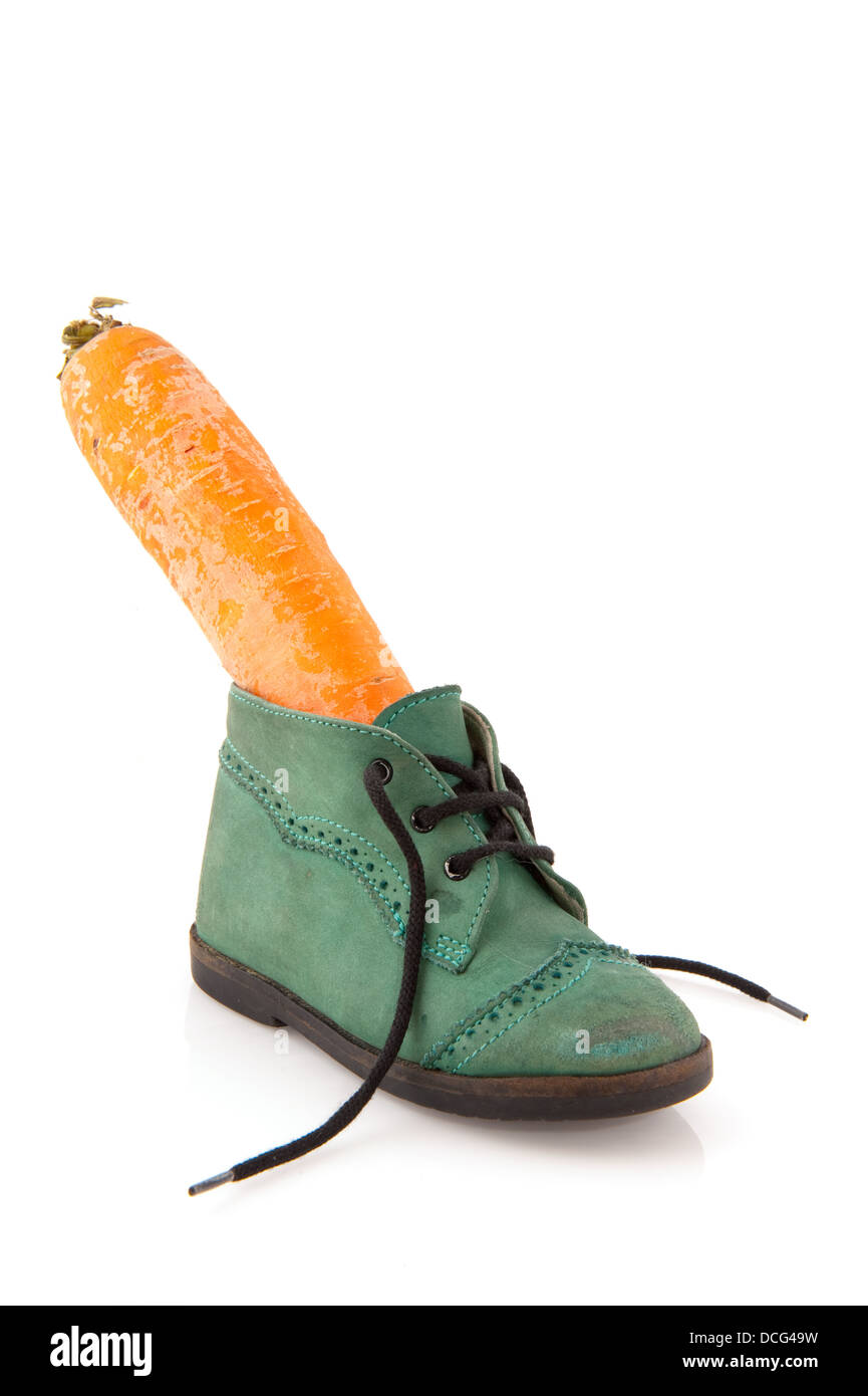 Shoe with carrot Stock Photo - Alamy