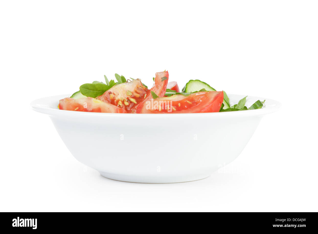 served plate with mix salad from tomatoes and cucumbers isolated on ...