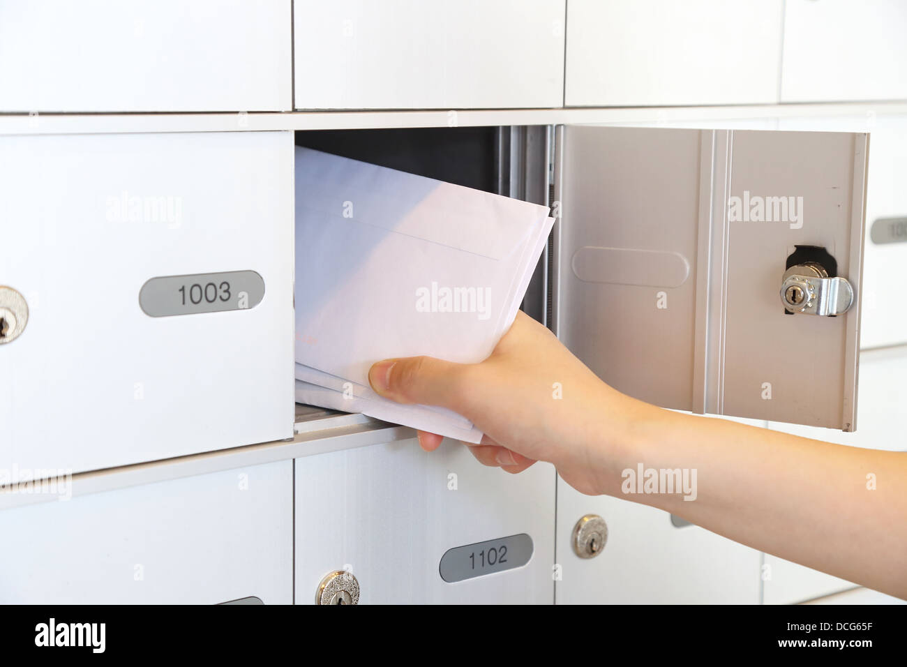 Mailbox letter human hand wall hi-res stock photography and images - Alamy