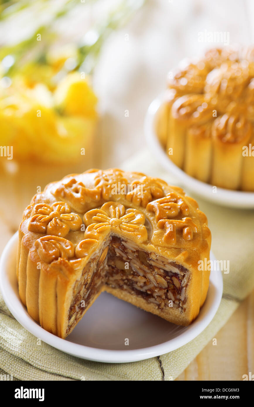 Sweet traditional mooncakes on table setting. Chinese mid autumn ...