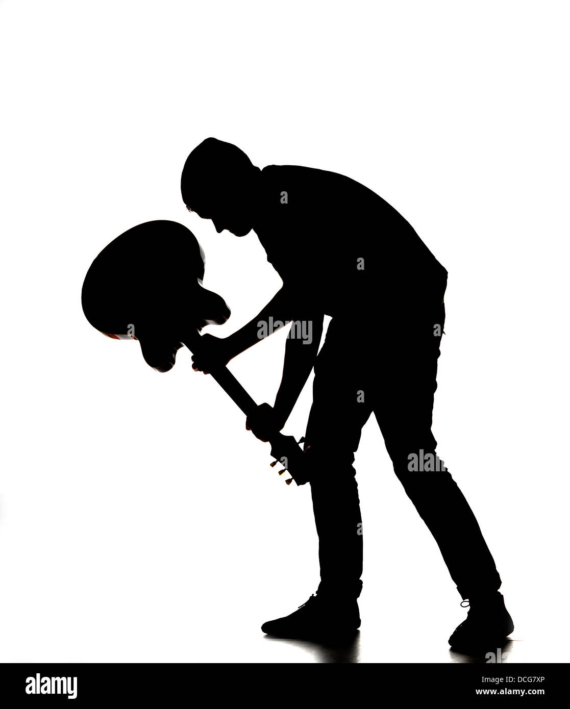 silhouette of a man smashing his guitar Stock Photo - Alamy