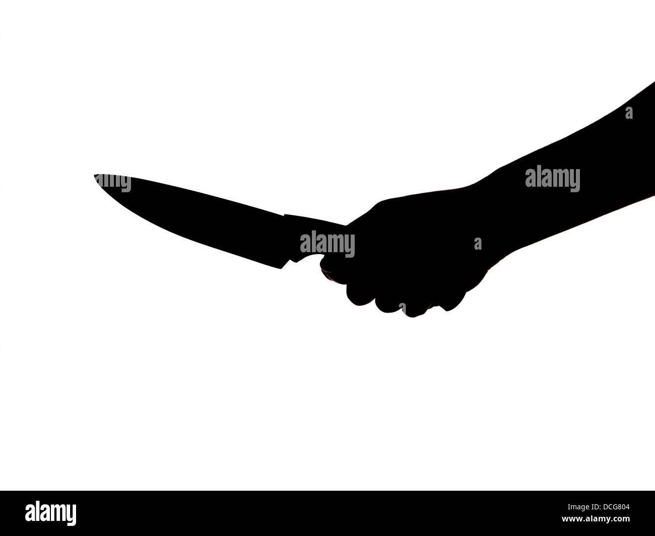 Silhouette og an hand holding a kitchen knife Stock Photo - Alamy