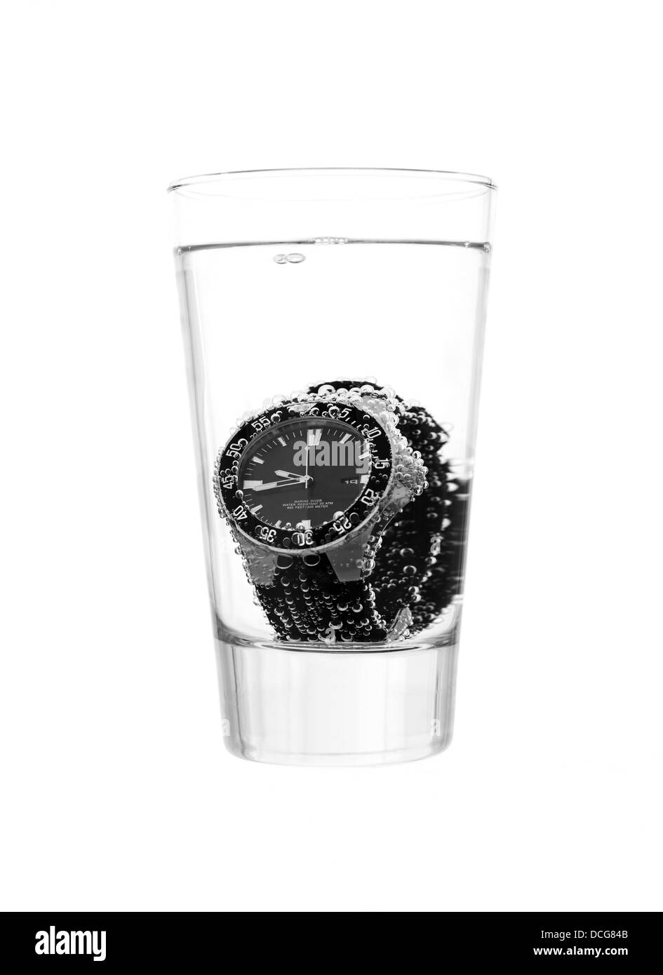 a glass with a clock inside Stock Photo - Alamy