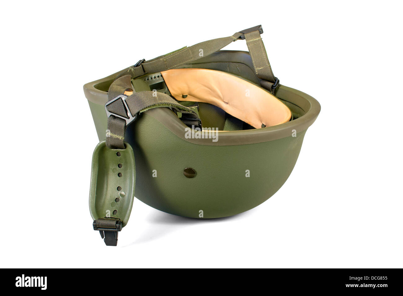 Military combat helmet with chin strap inverted and isolated on white ...
