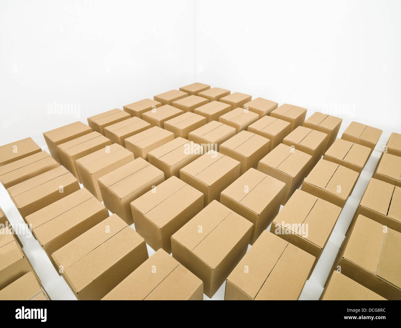 Arranged cardboard boxes Stock Photo - Alamy