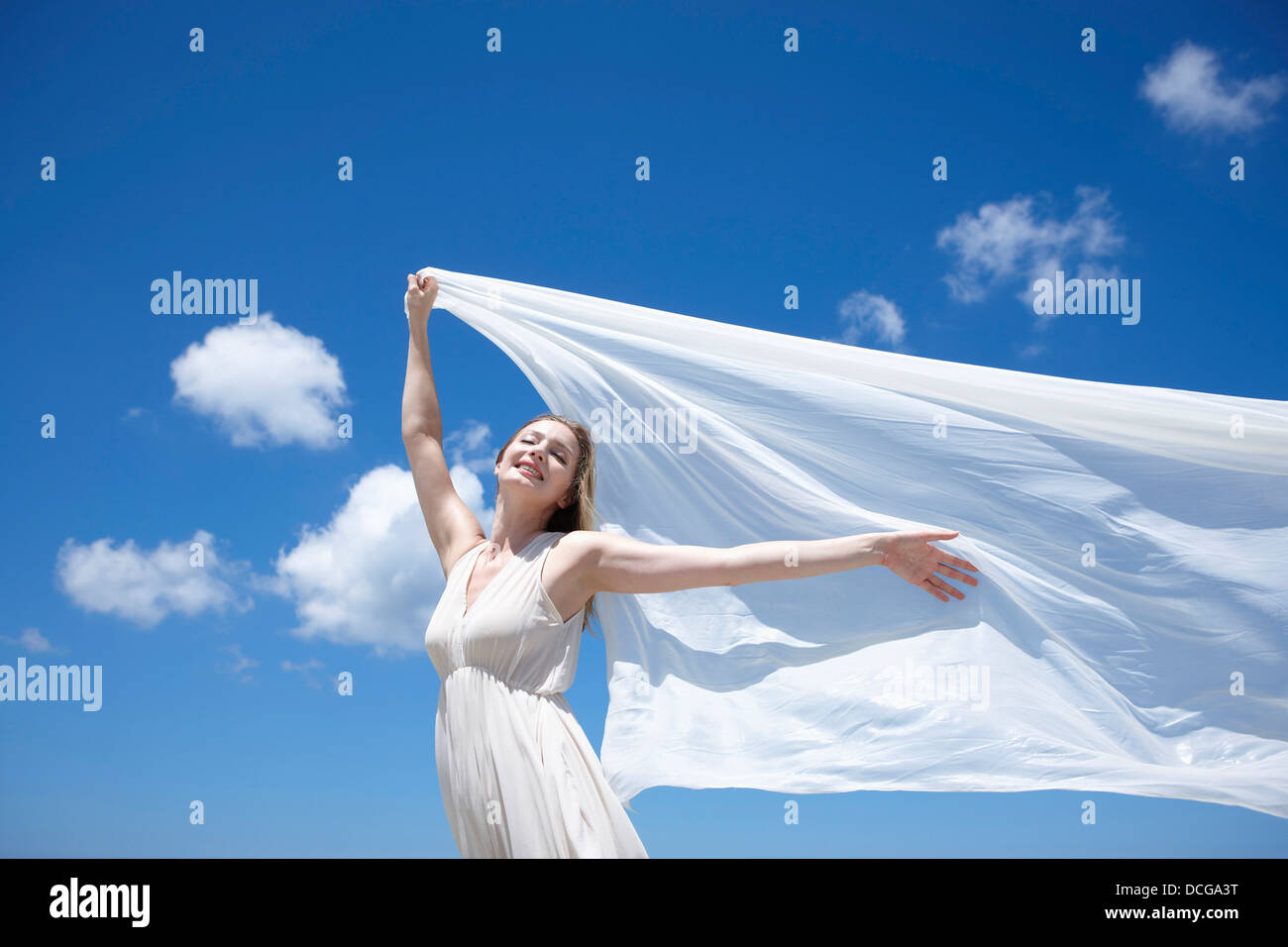 Woman bright white cloth hi-res stock photography and images - Alamy