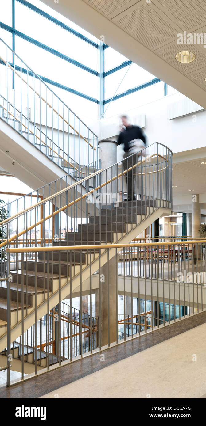 Man walking the stairs Stock Photo - Alamy