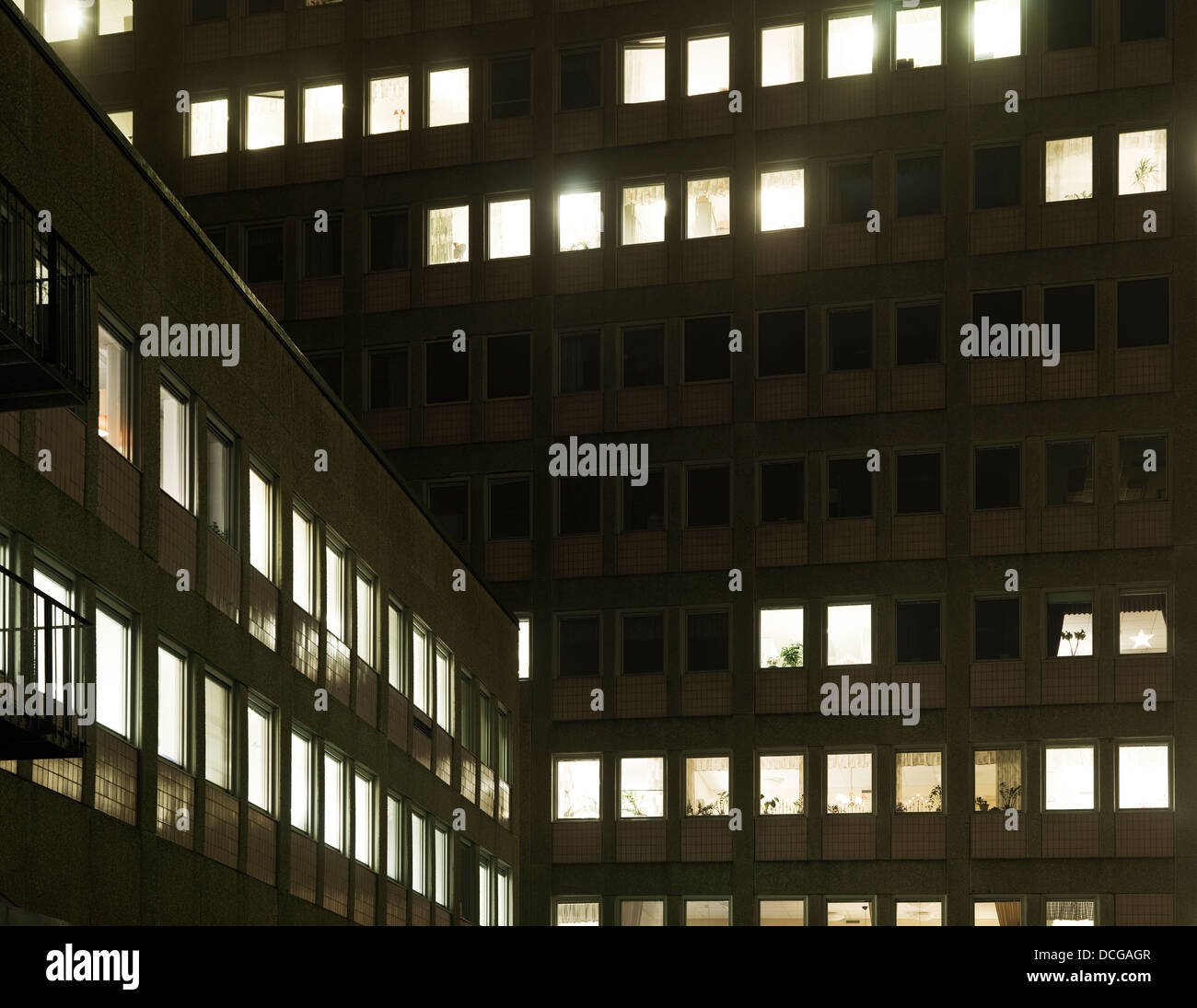 House with lighted windows Stock Photo - Alamy