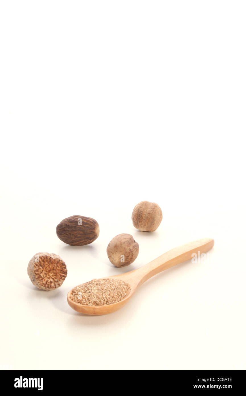 nutmeg also some nutmeg powder and one spoon Stock Photo - Alamy