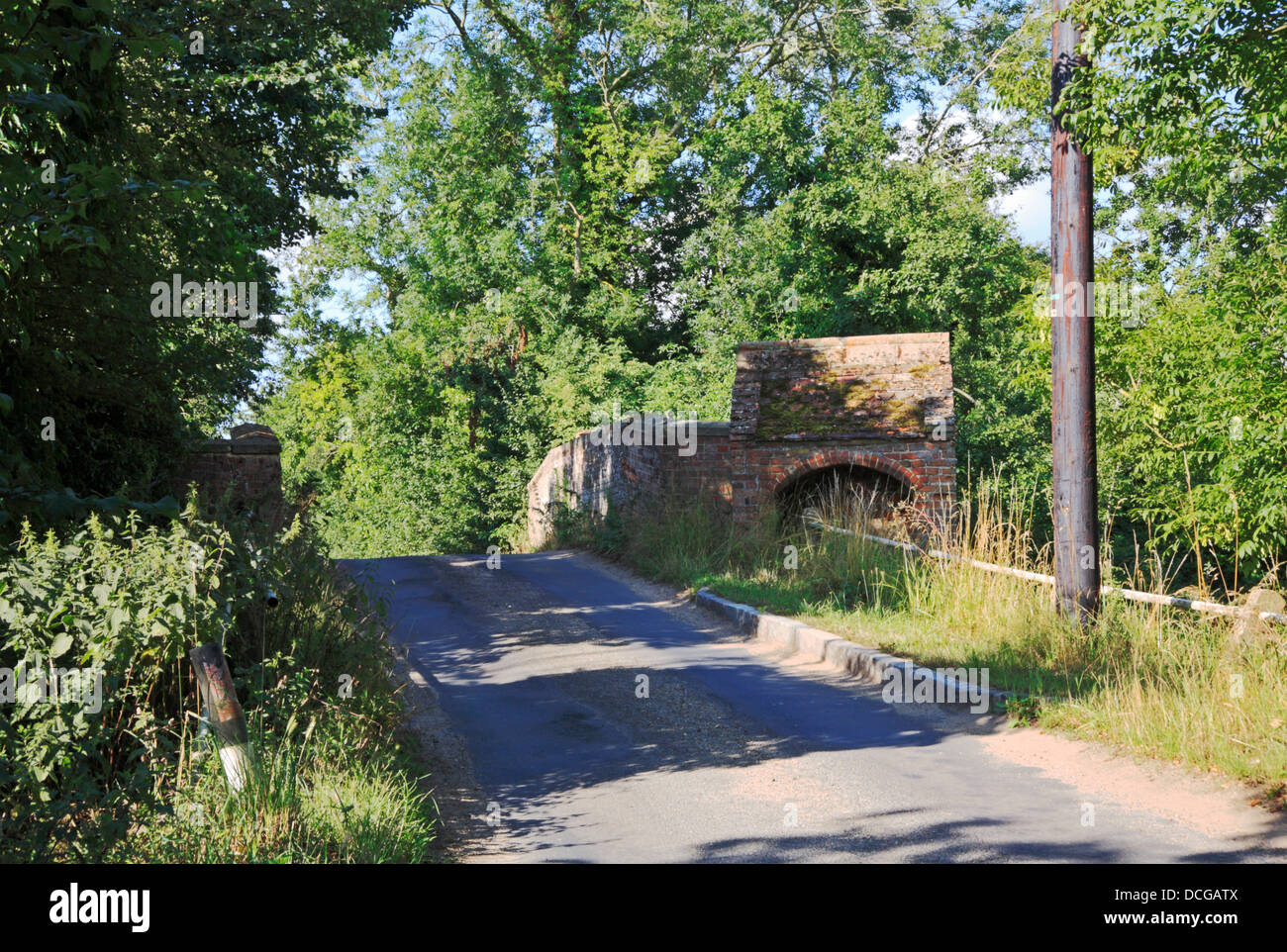 A view of the old 16th Century Mayton Bridge over the former course of ...