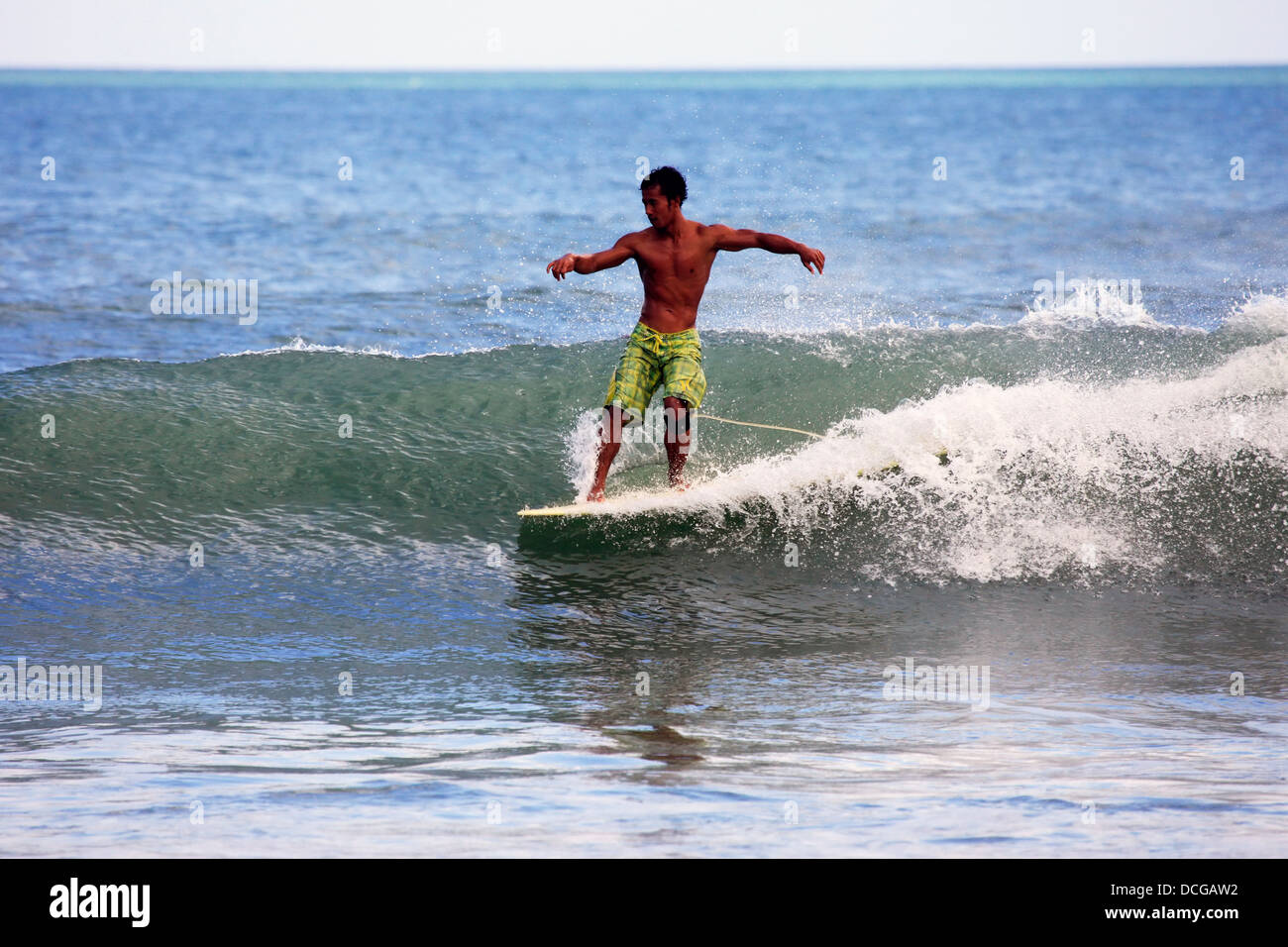 Surfer in ocean Stock Photo - Alamy