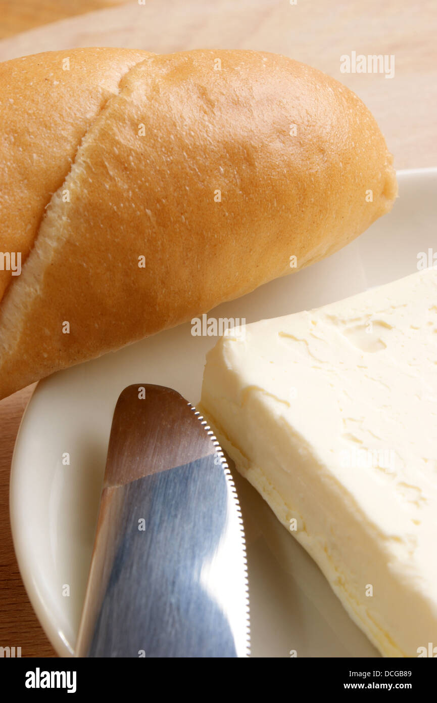 breakfast with bread roll and organic butter Stock Photo - Alamy