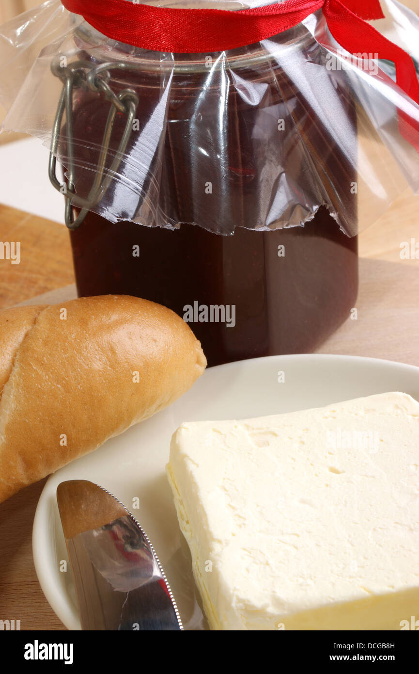 breakfast with bread roll and organic butter Stock Photo - Alamy