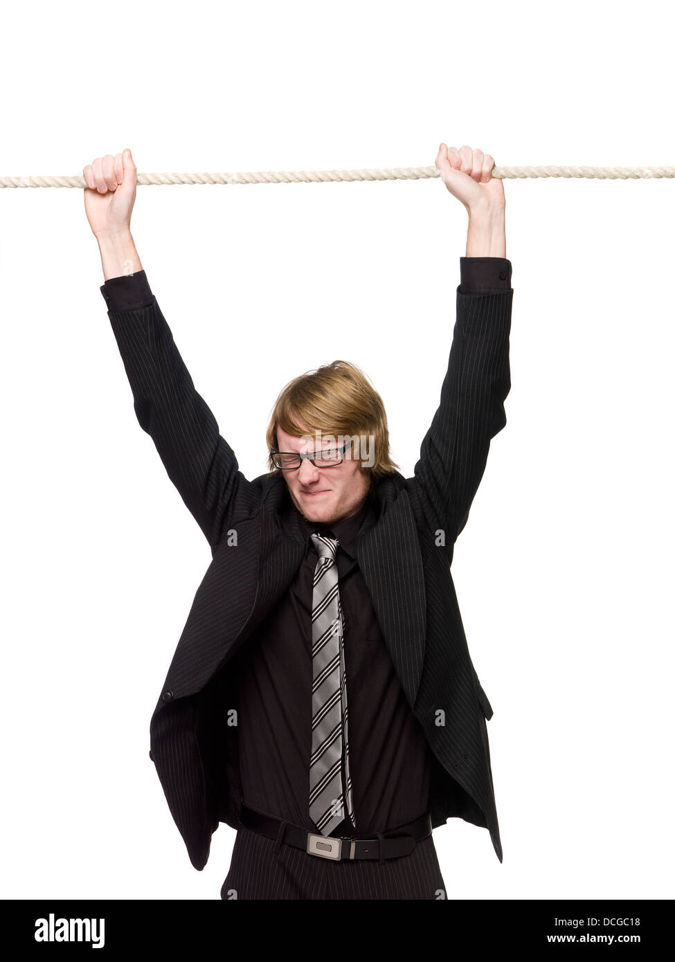Man hanging in a rope Stock Photo - Alamy