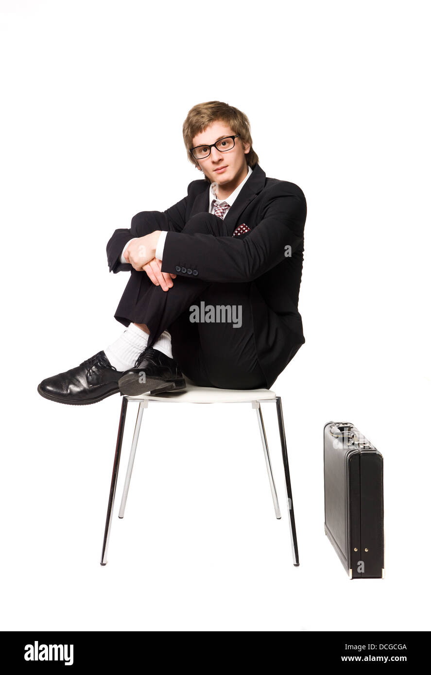 Man siting on a chair Stock Photo - Alamy