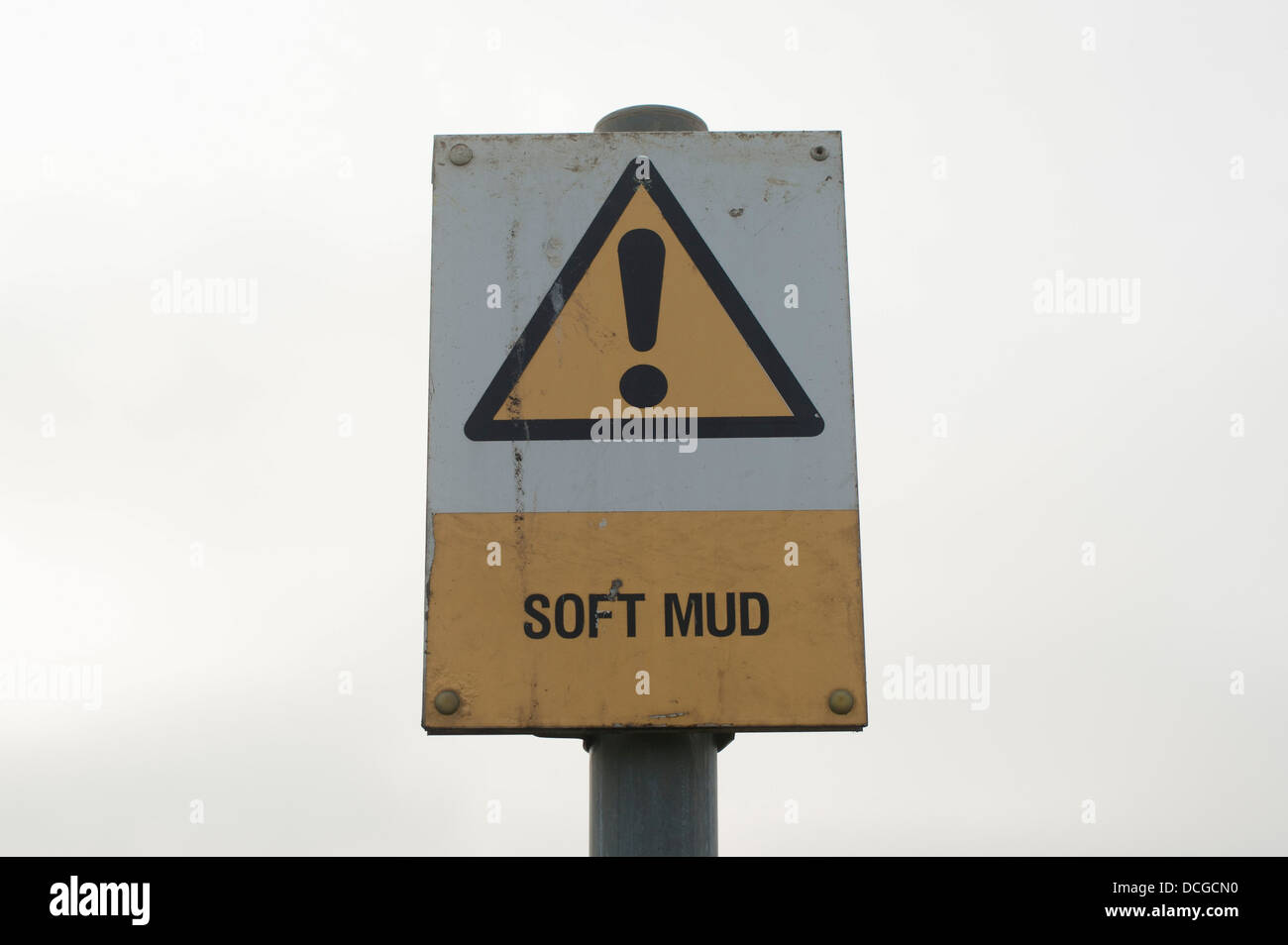 A 'soft mud' sign is pictured on the bank of the River Thames Stock ...