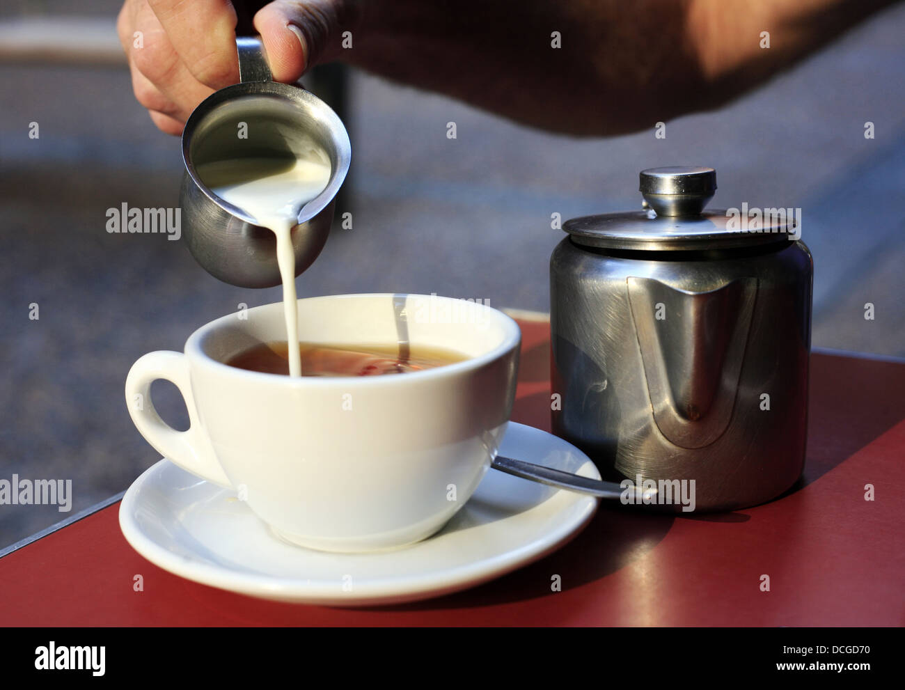 Tea with milk Stock Photo - Alamy