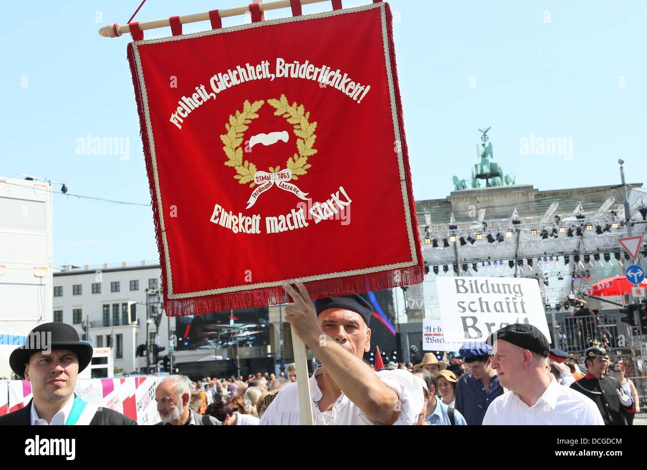 Berlin, Germany. 17th Aug, 2013. Dressed as members of the labor ...