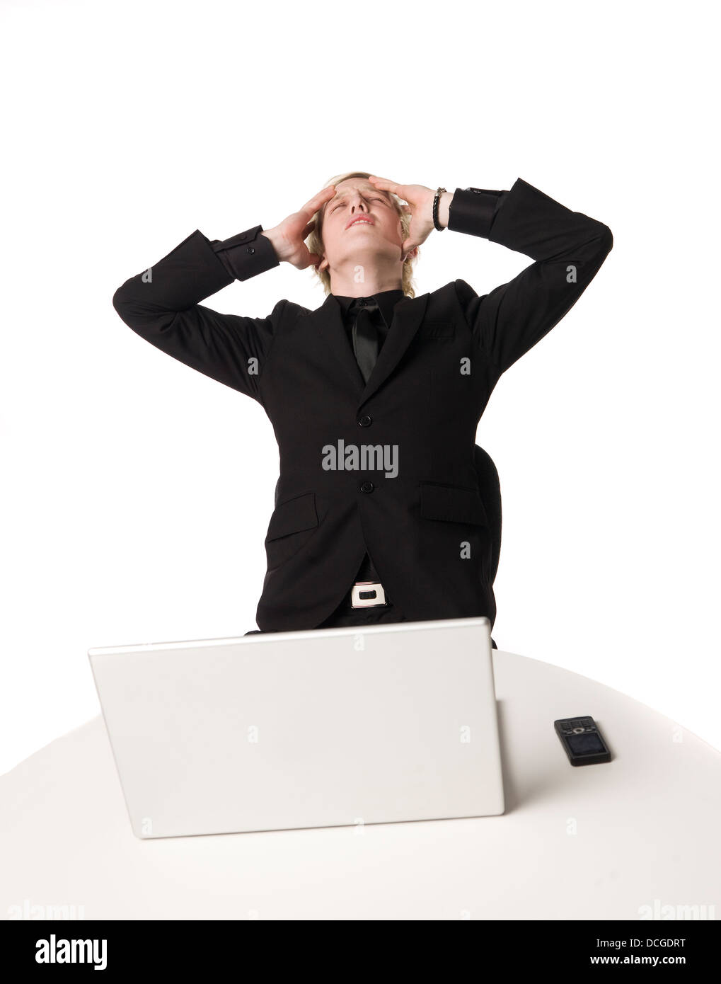 Man looking on a computer Stock Photo - Alamy