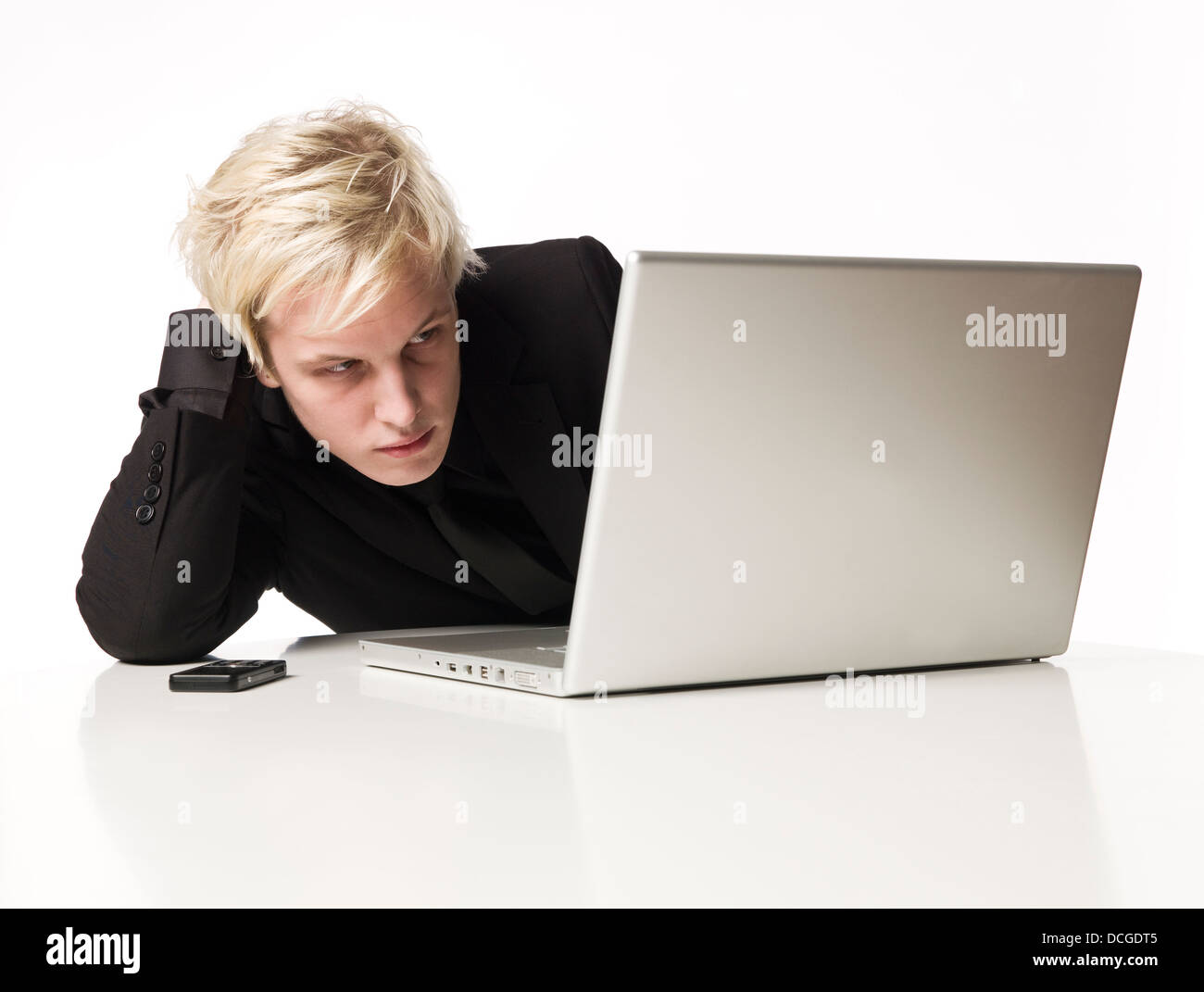 Man reading on a computer Stock Photo - Alamy