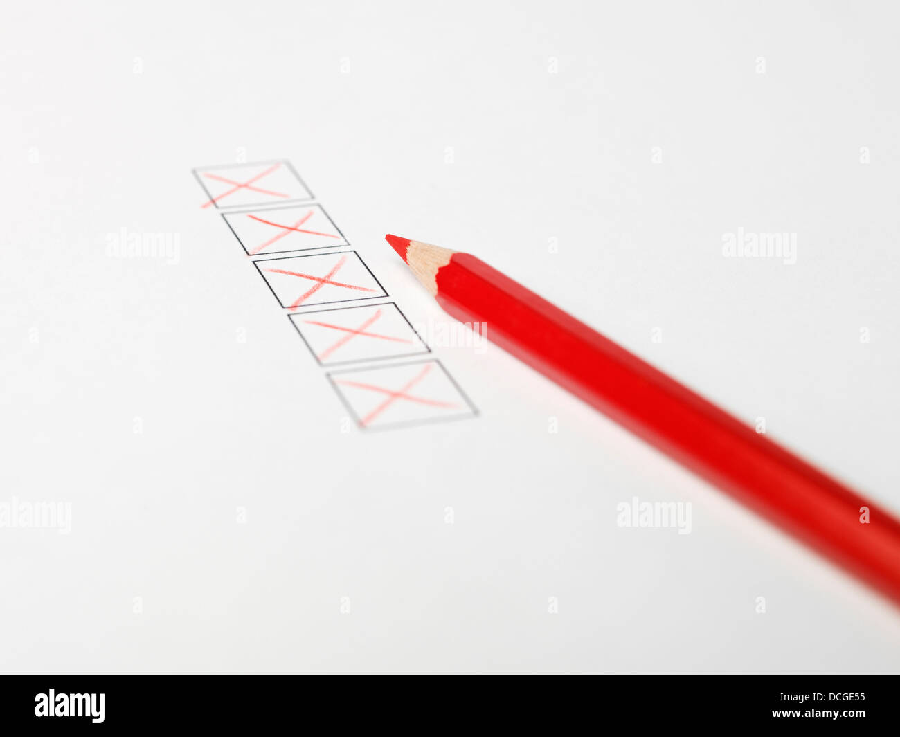 Red pencil and check boxes Stock Photo - Alamy