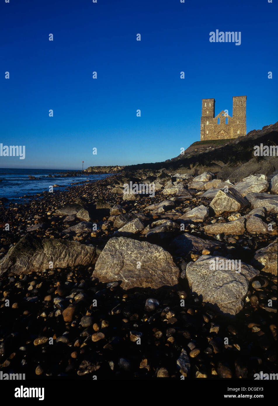 The imposing twin towers of the medieval church at Reculver dominate ...