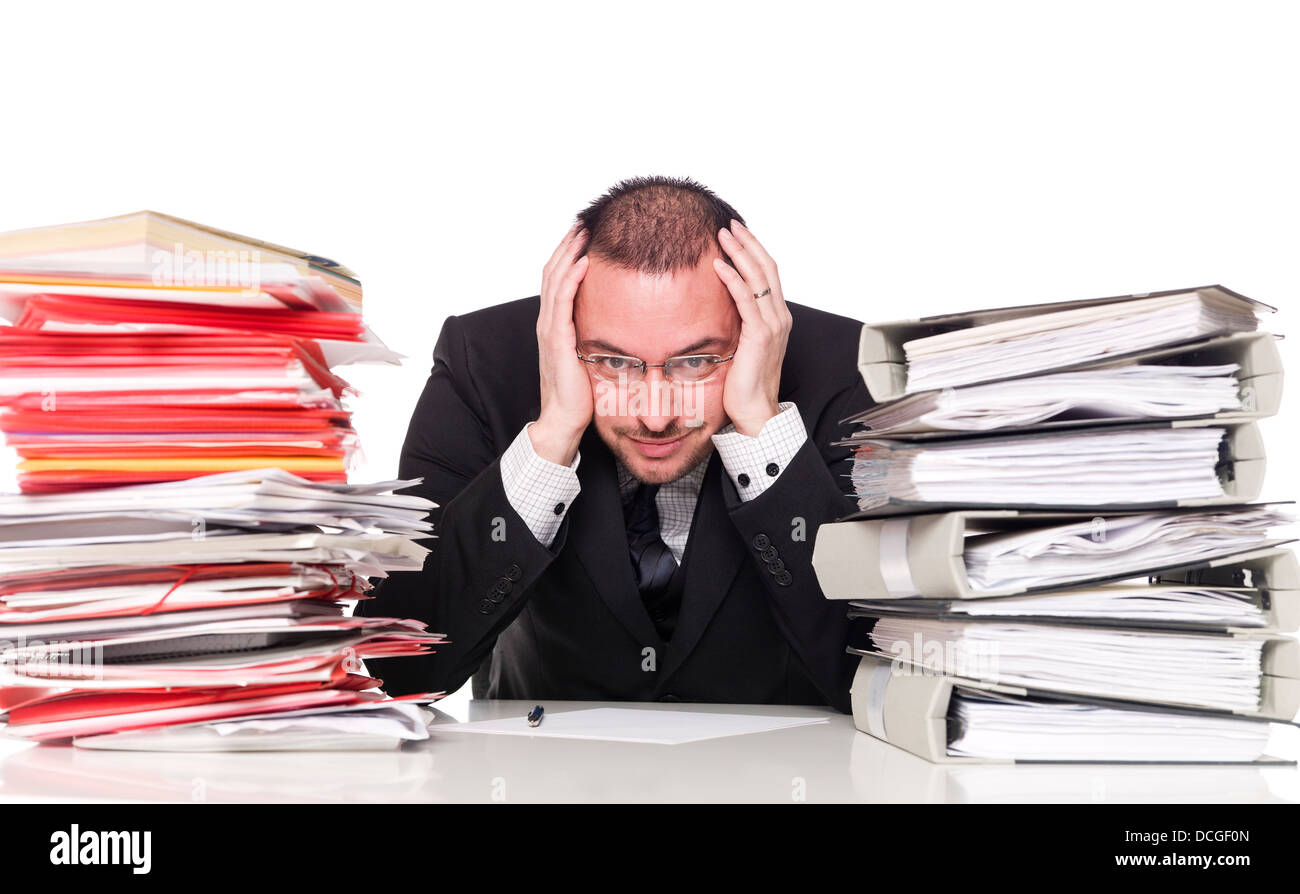 Hard working man in a office Stock Photo - Alamy
