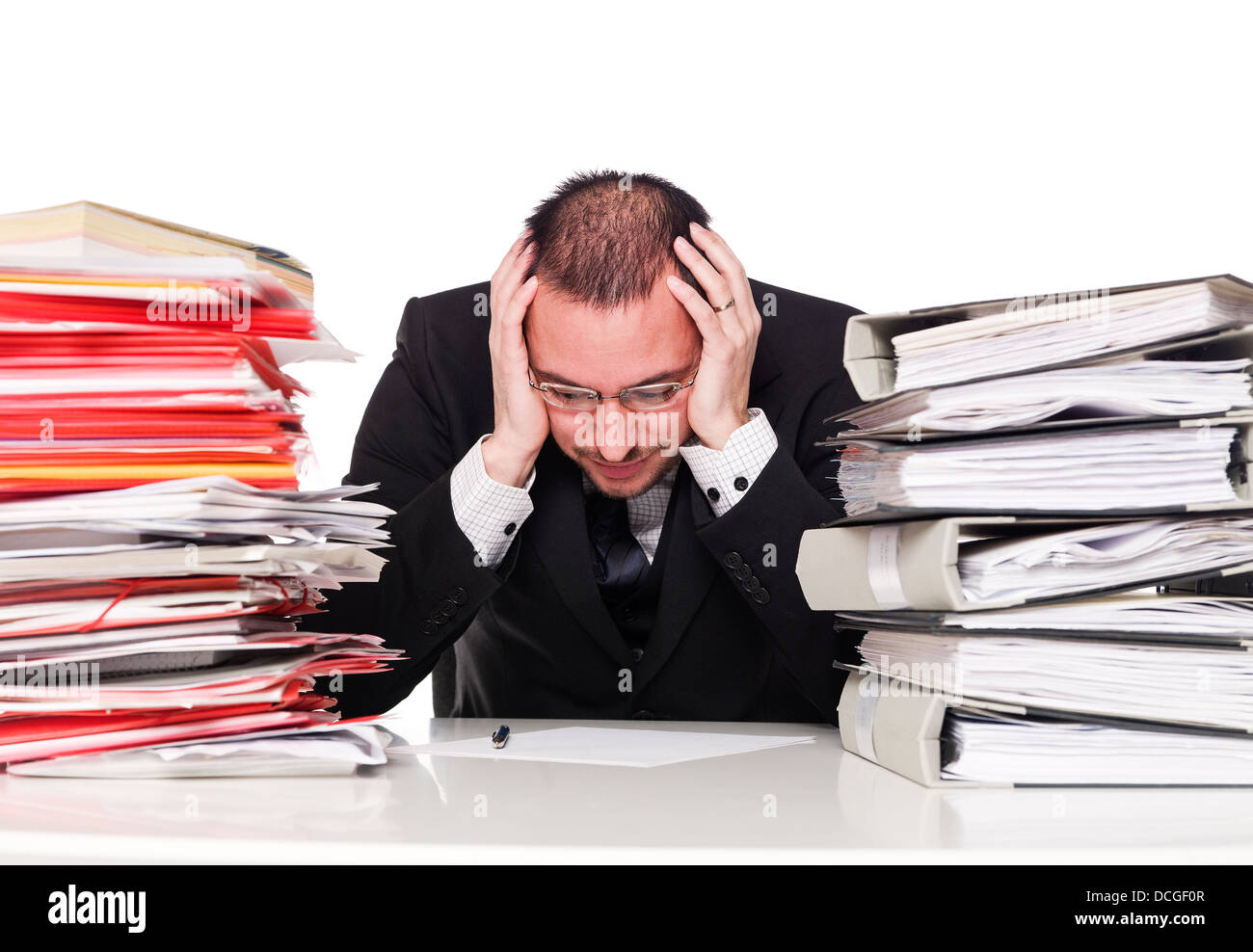 Hard working man in a office Stock Photo - Alamy