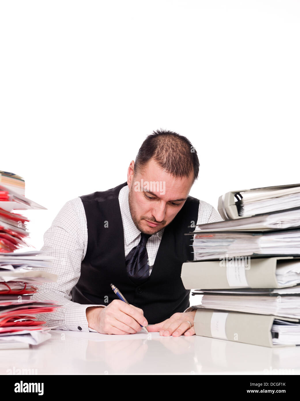 Hard working man in a office Stock Photo - Alamy