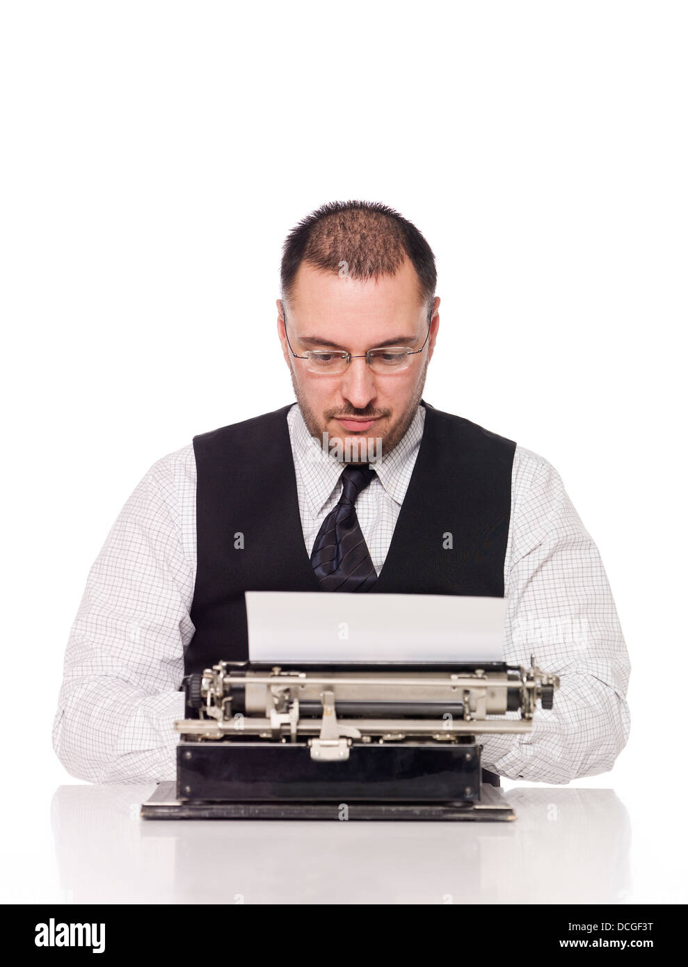 Man writing on a vintage typewriter Stock Photo - Alamy