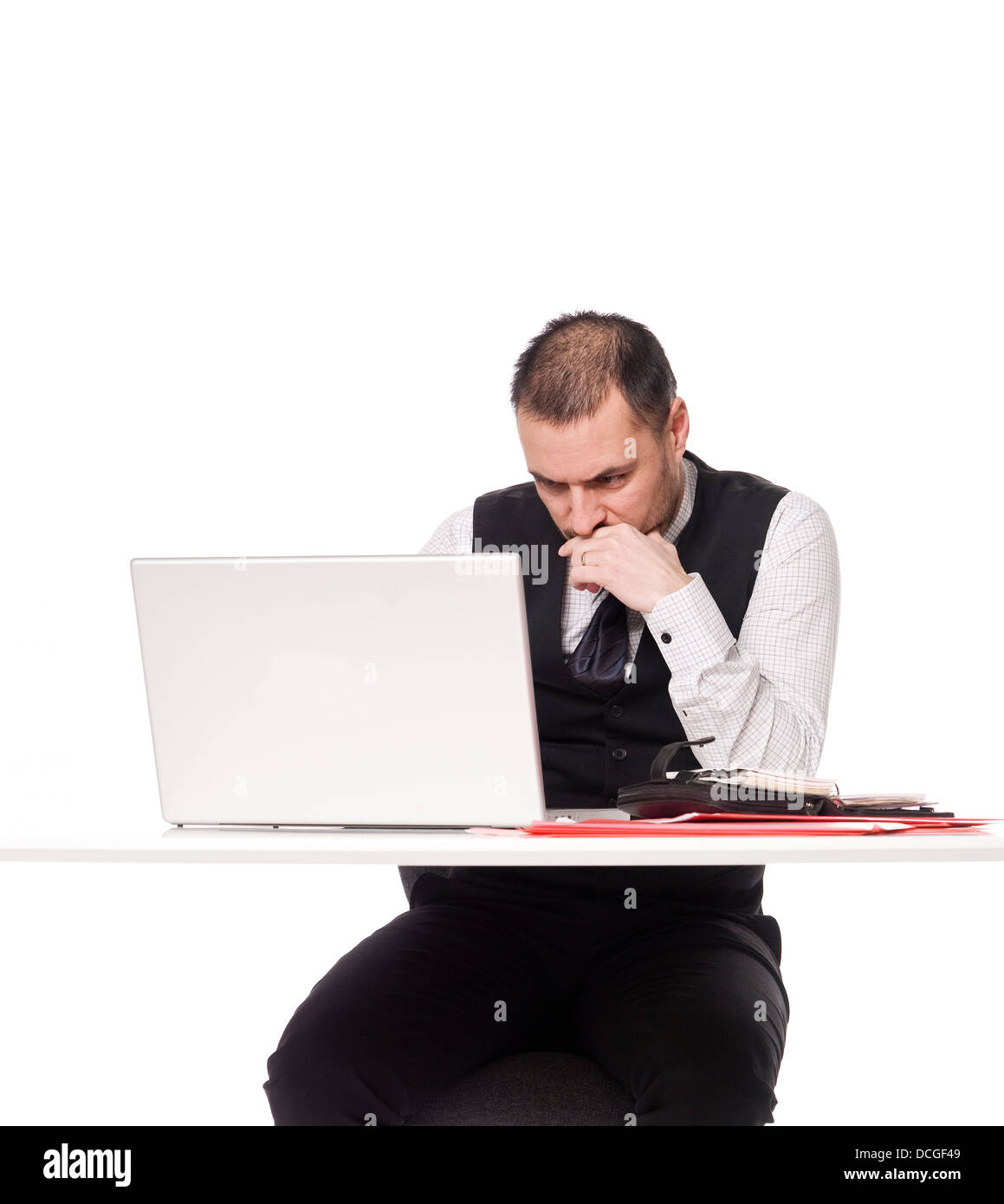 Man reading on his computer Stock Photo - Alamy