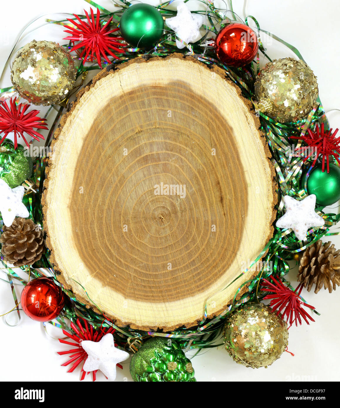 stump decorated with Christmas ornaments (balls, cones, stars Stock ...